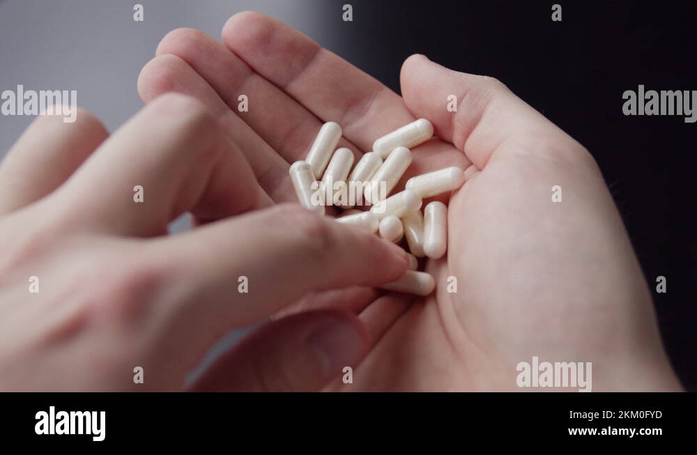 White capsule hand Stock Videos & Footage - HD and 4K Video Clips - Alamy