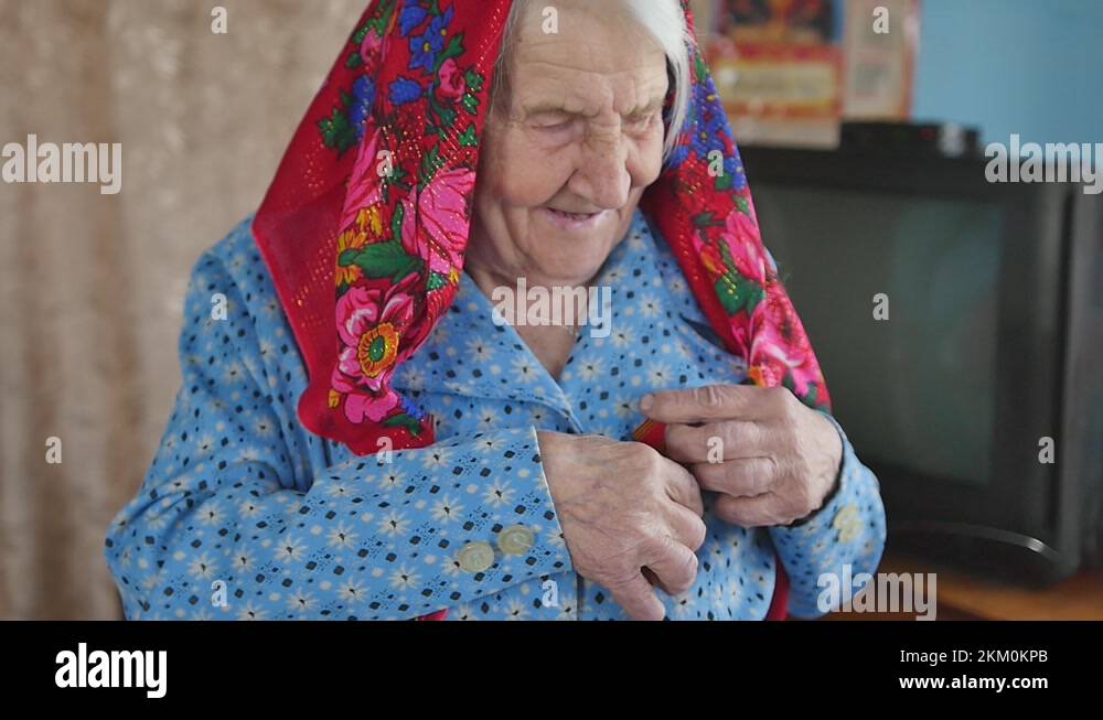 Old lady veteran with medals. Soviet union awards. Celebrating may of 9 ...
