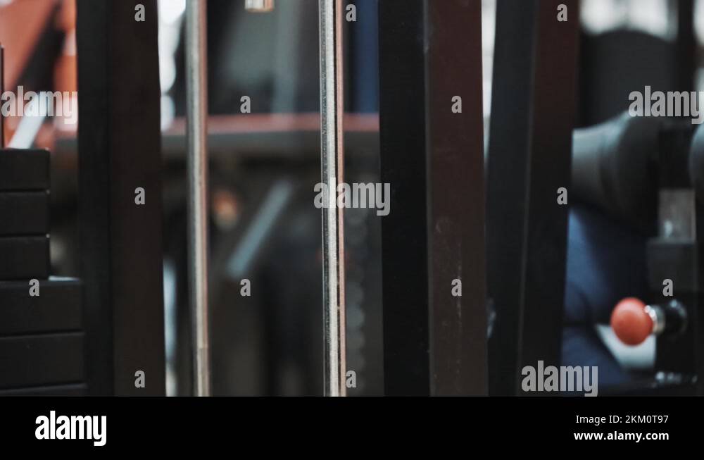 Working mechanism of weight stack in a gym trainer machine Stock Video ...