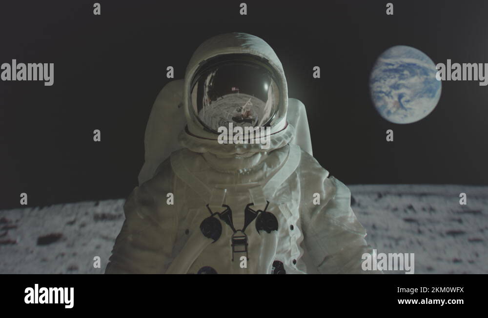 Apollo 11 astronaut on the moon surface with earth in the background ...