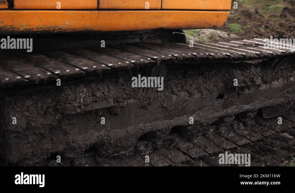 Tracked mechanical digger. Heavy machine. Bulldozer. Caterpillar ...