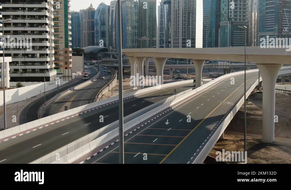 Lots of traffic on different levels of a massive intersection in Dubai ...