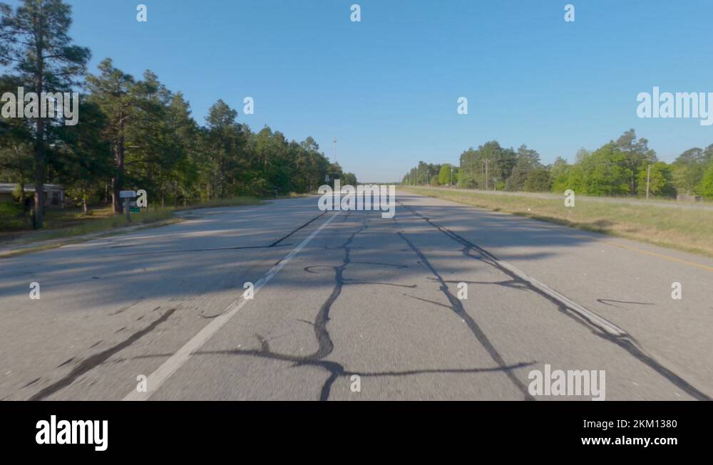 Rear camera view POV FPV looking back at the road with traffic Stock ...