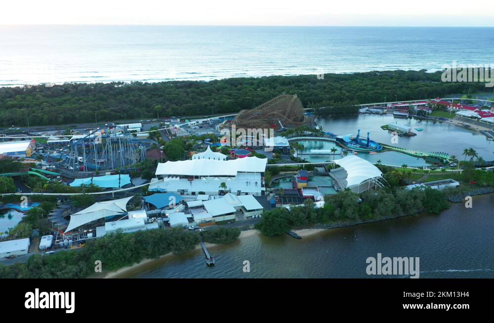 Drones eye view of Seaworld Theme Park at sunrise, new rollercoaster ...