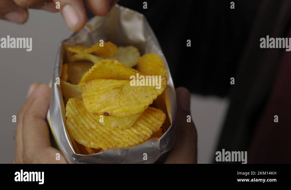 Bag of crisp crisps potato chip chips Stock Videos & Footage - HD and ...