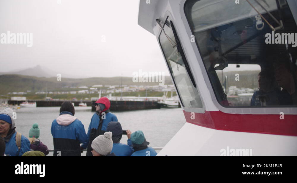 Side view of captain seat on boat and deck full of people Stock Video ...