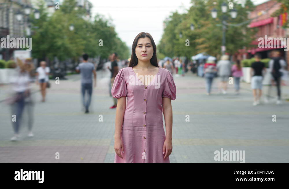 Girl standing out of crowd city Stock Videos & Footage - HD and 4K ...