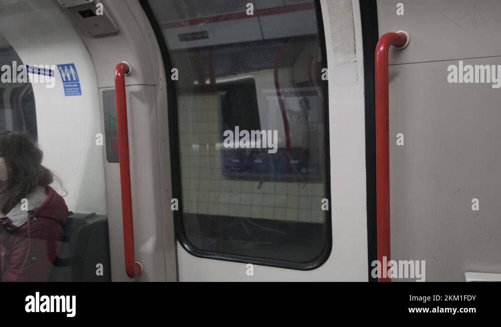 London Tube doors opening at Queensway underground station central line ...