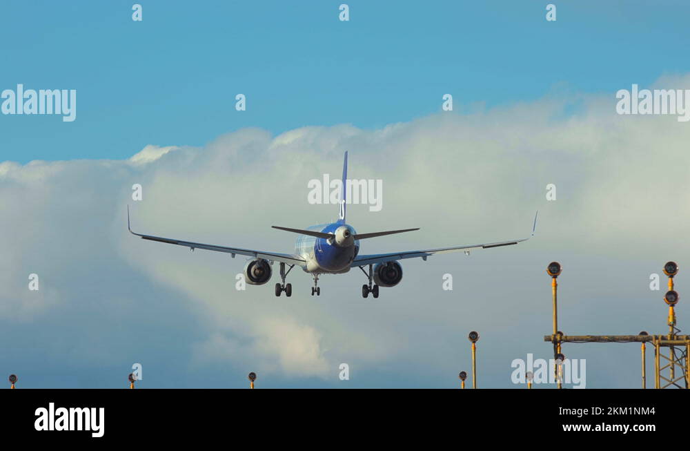 airplane airbus a320 neo passing overhead rear view landing Stock Video ...