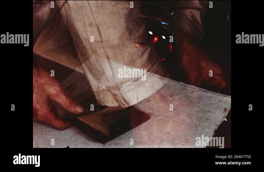 1940s Bikini Atoll: Fish sample is placed under infrared heat lamp ...