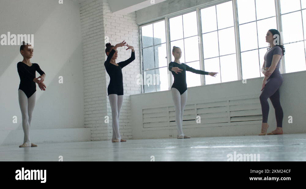 Dance class for teen girls. Kids learning basics of rhythmic gymnastics ...