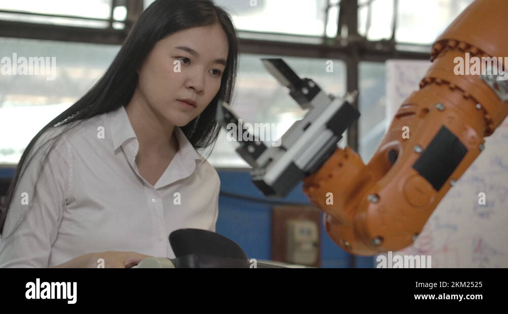Industrial Robotics Engineer Is Testing And Program Robot Arm Stock Video Footage Alamy