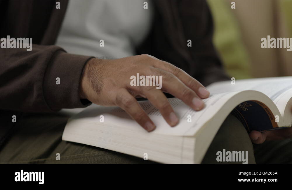 Reading book one hand Stock Videos & Footage - HD and 4K Video Clips ...