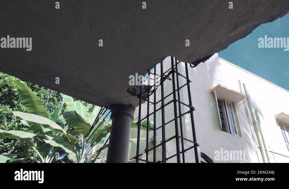 Installing Iron Bars Against Ceiling For House Pillar Columns Linking ...