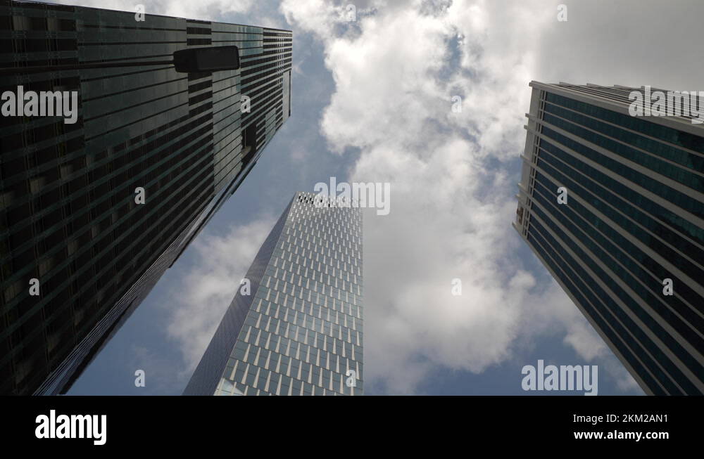 singapore city downtown office skyscraper up view slow motion panorama ...