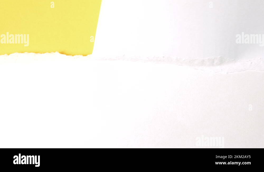 Tear off part of white paper with yellow background. Paper ripping ...
