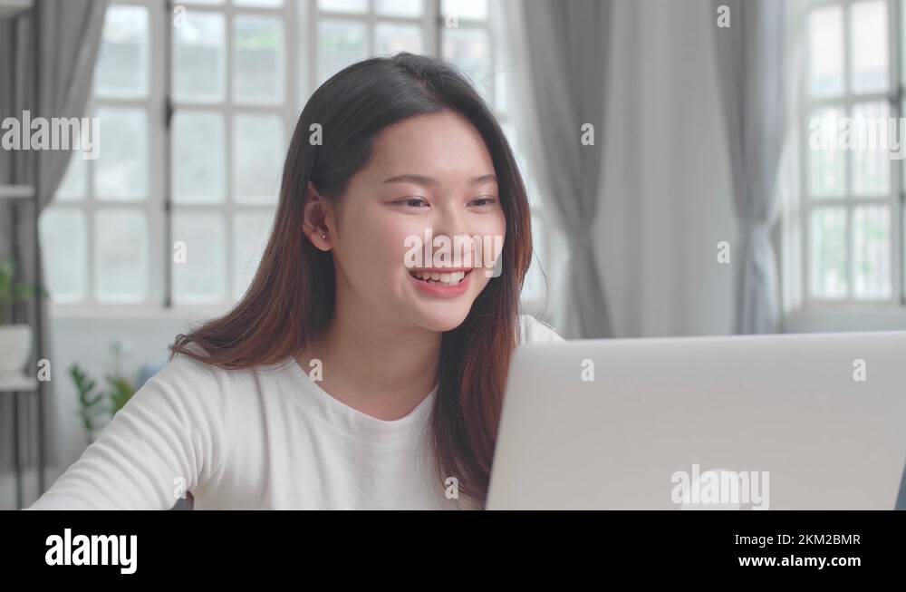 Asian Girl With Laptop Computer Having Video Call At Home , Video In 4K ...