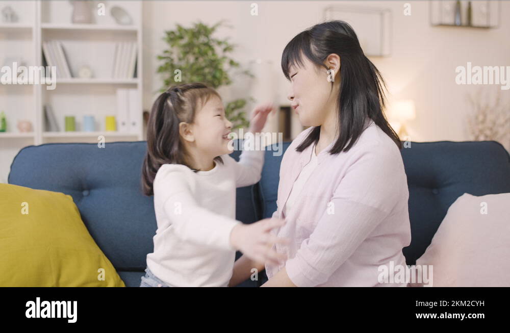 Sincere love emotions of asian little daughter and mother hugging, happy family Stock Video ...