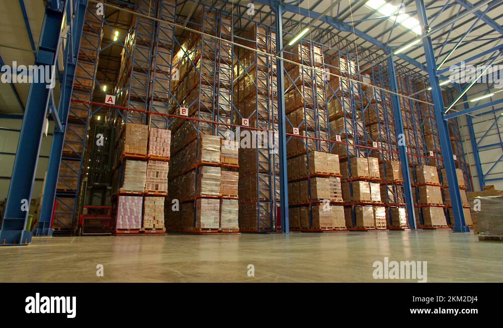 Warehouse with cardboard boxes on pallet racks, logistics center Stock ...
