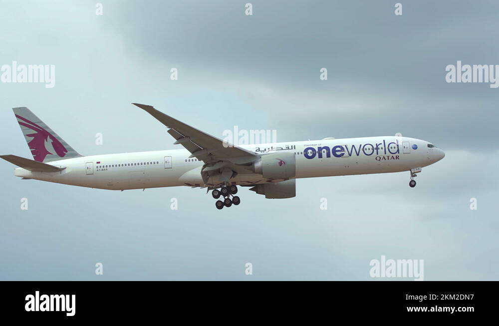 huge airplane boeing 777 qatar airways in flight side view one world ...