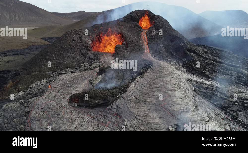 Lava flowing from active volcano from aerial view in 4k Dlog Stock ...