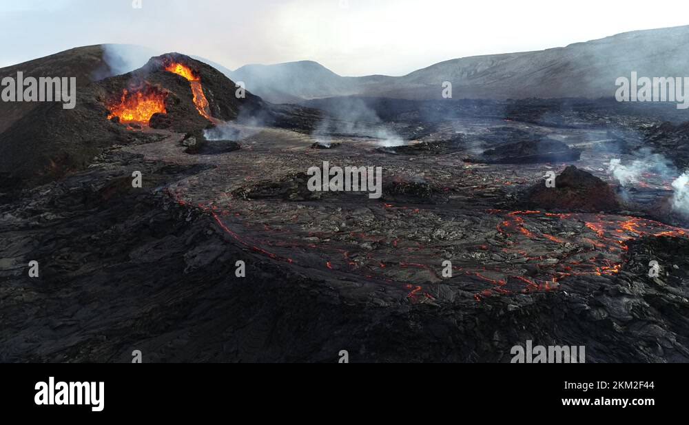 Lava flowing from active volcano from aerial view in 4k Dlog Stock ...
