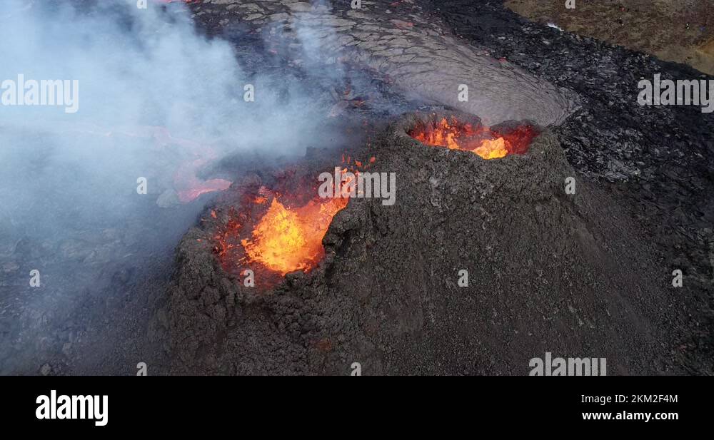 Lava flowing from active volcano from aerial view in 4k Dlog Stock ...