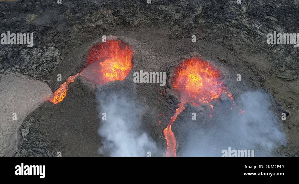 Lava flowing from active volcano from aerial view in 4k Dlog Stock ...