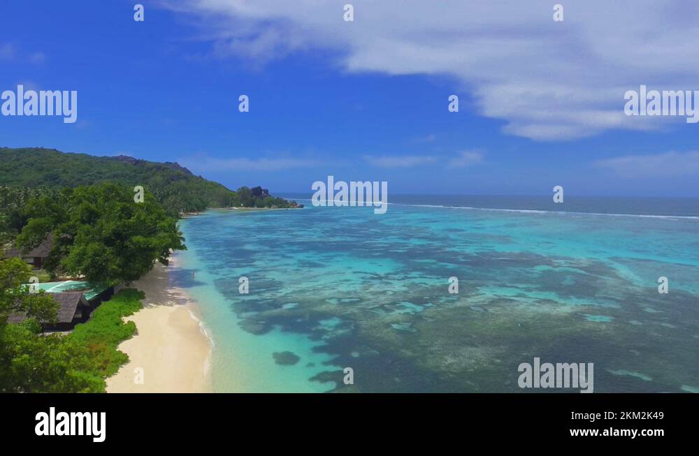 Dron view Anse source d'argent azure sea water (Indian Ocean), La Digue ...