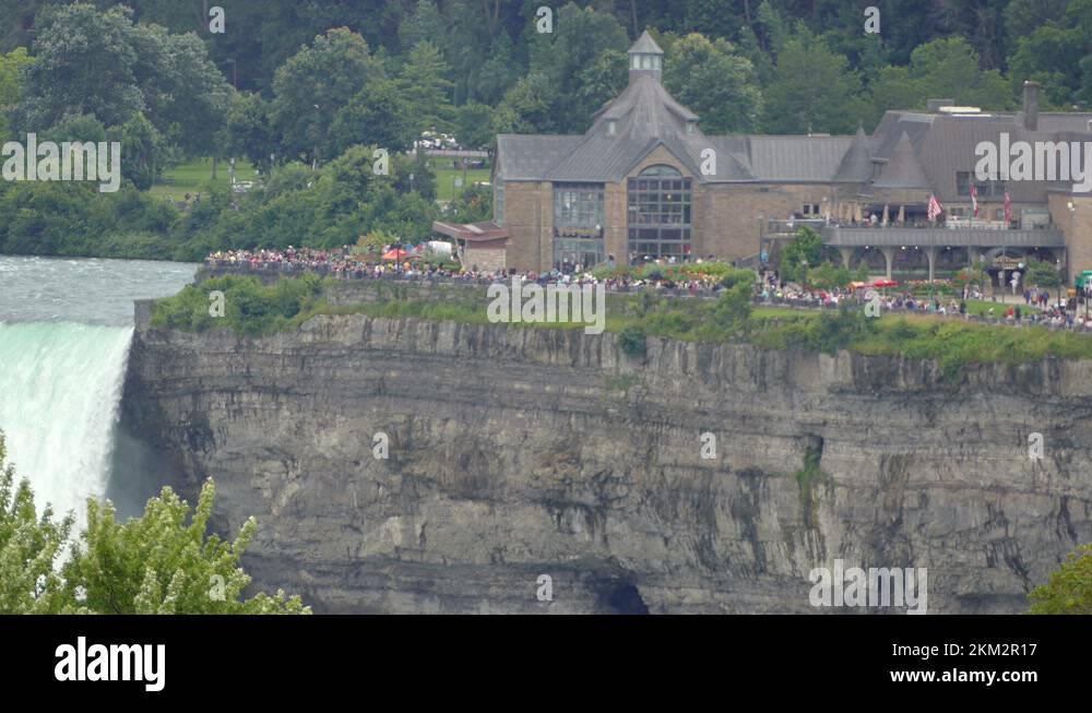 Large group of tourists view Niagara Falls table rock welcome center ...