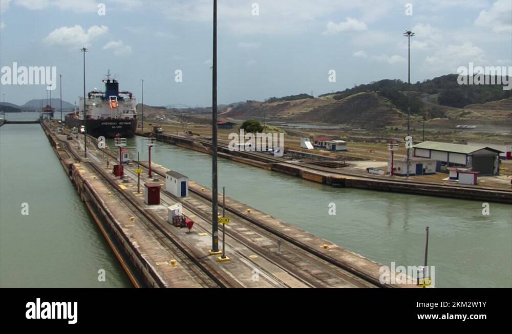 Commercial ship transiting Pedro Miguel Locks at Panama Canal Stock ... Commercial ship transiting Pedro Miguel Locks at Panama Canal Stock ...