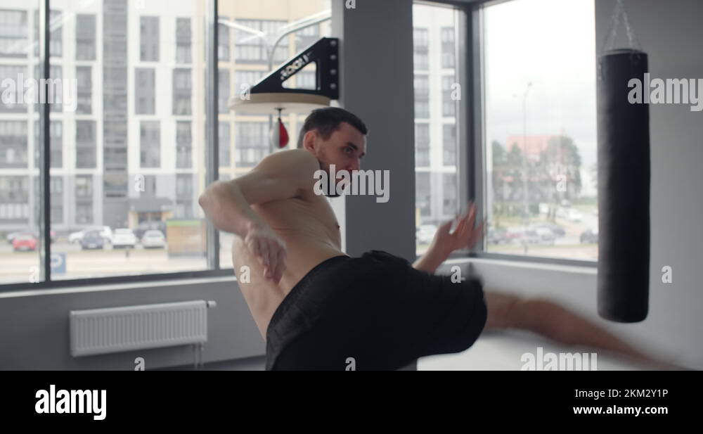 Mixed martial art fighter does shadow boxing and trains at boxing club, fighter Stock Video ...