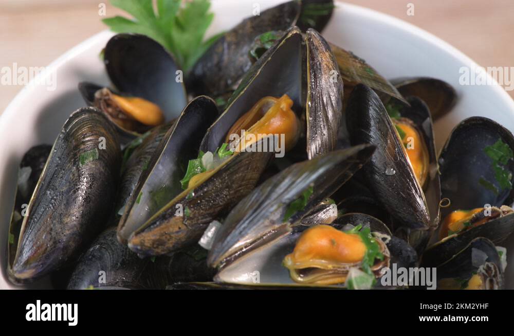 Moules mariniere fresh steamed mussels Stock Videos & Footage - HD and ...
