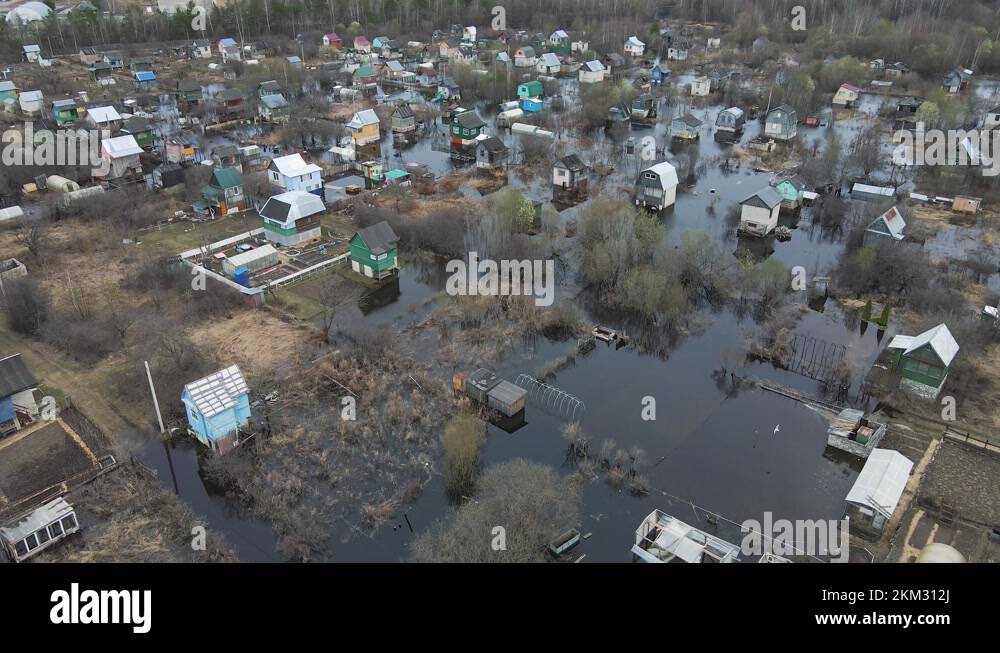 Spring flood, bird's-eye view, flooded garden houses below Stock Video ...