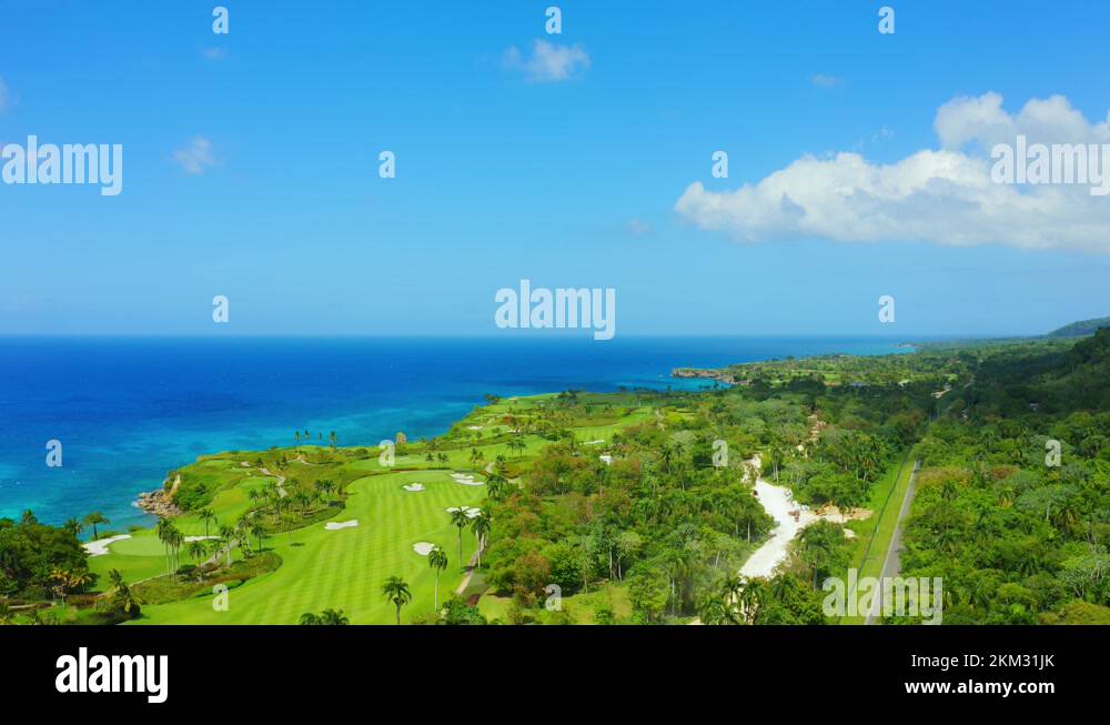 Island and sea 4k background. A green island of the Atlantic ocean ...
