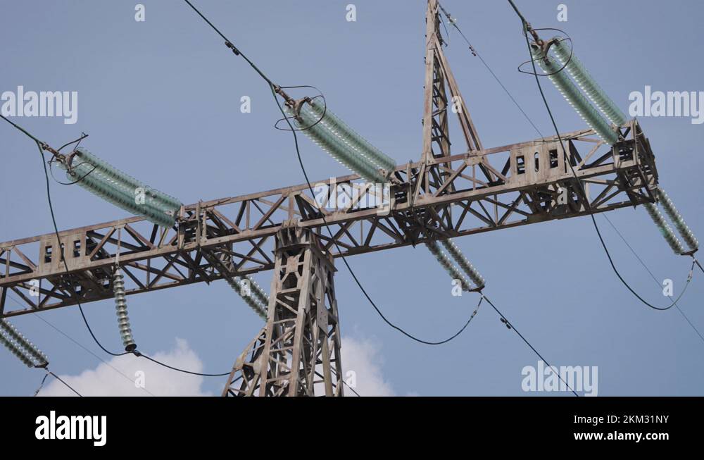 high voltage power lines. Powerful wires conduct high voltage currents ...