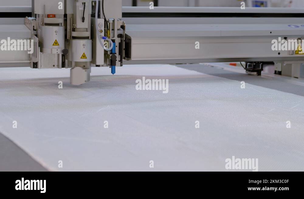 Flatbed cnc cutter during work - box cutting and creasing plotter ...