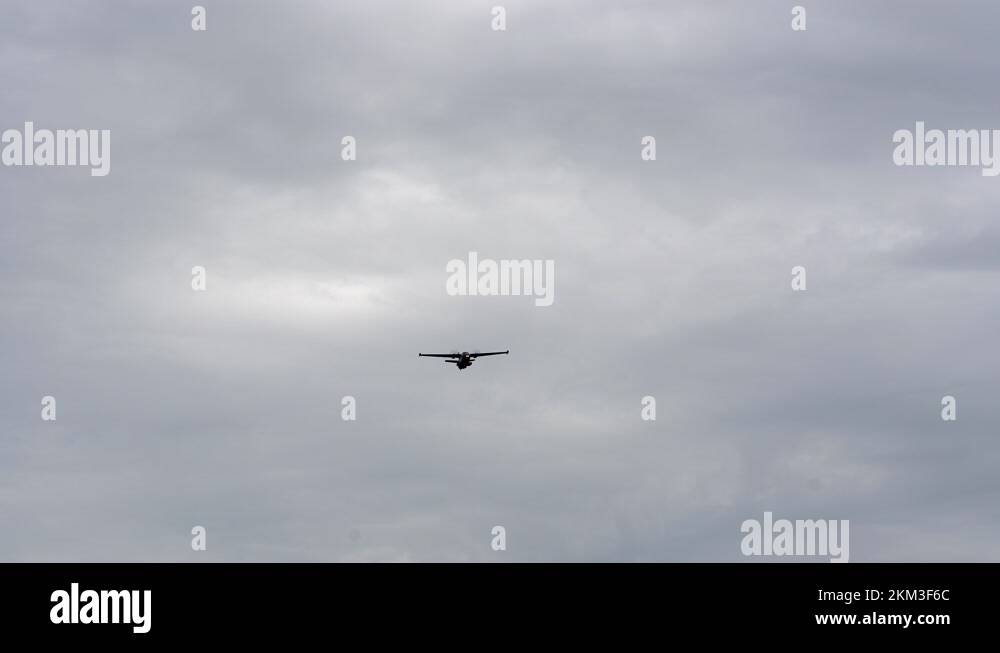 overhead plane fly in cloudy sky.professional military pilots prepare ...