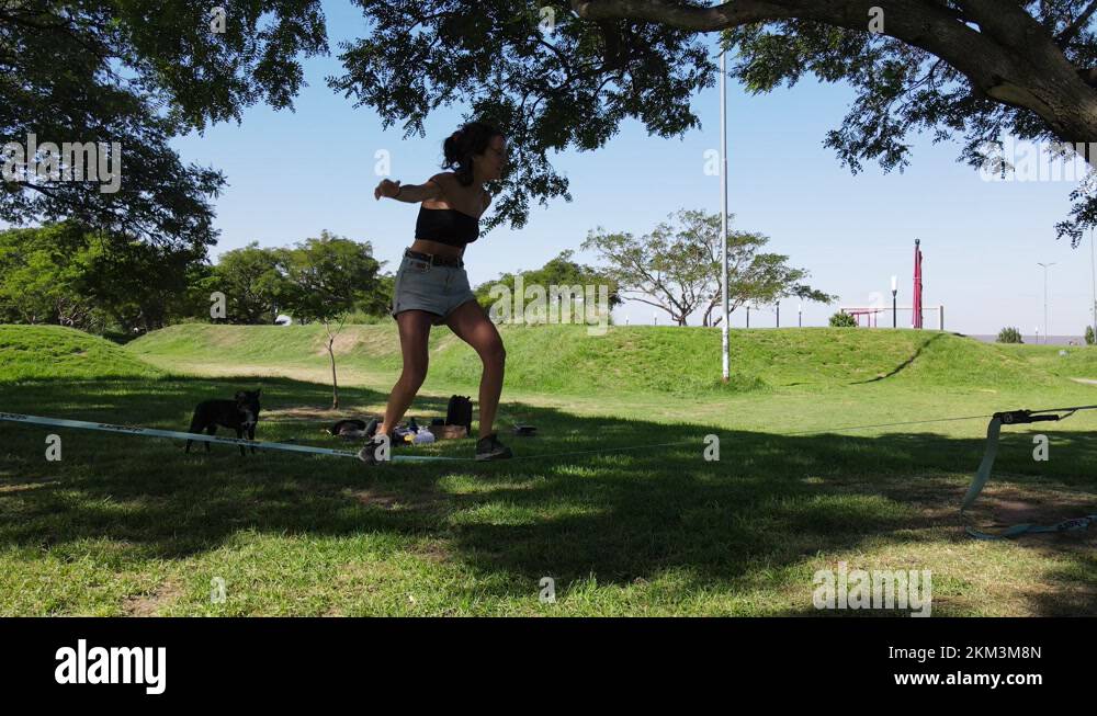 Walking a balance beam or slack line Stock Videos & Footage - HD and 4K ...