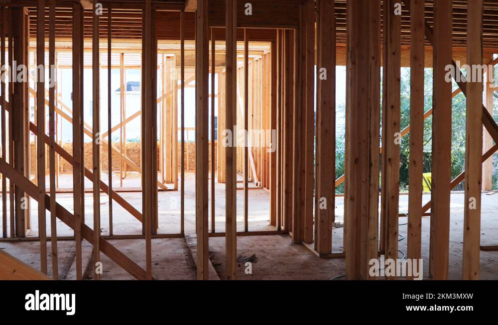 Open in industrial unfinished wood frame building or a house under ...