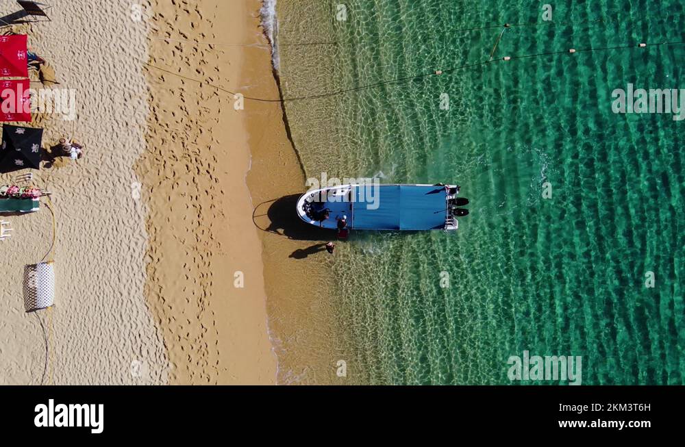 Boat arriving at a beach Stock Videos & Footage - HD and 4K Video Clips ...