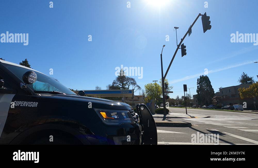 police car driving on city street Stock Video Footage - Alamy