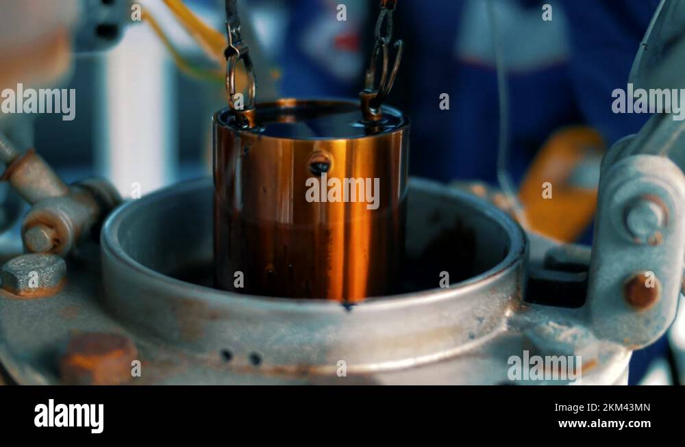 Oil sampling from oil storage for quality control Stock Video Footage ...