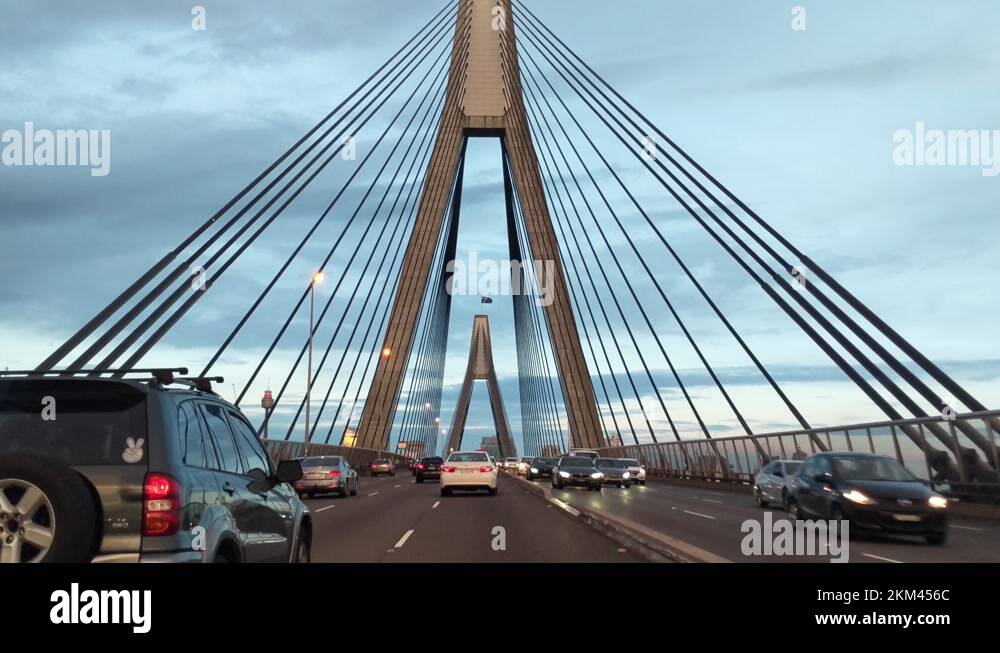 Drive through The Anzac Bridge, an eight-lane cable-stayed bridge that ...