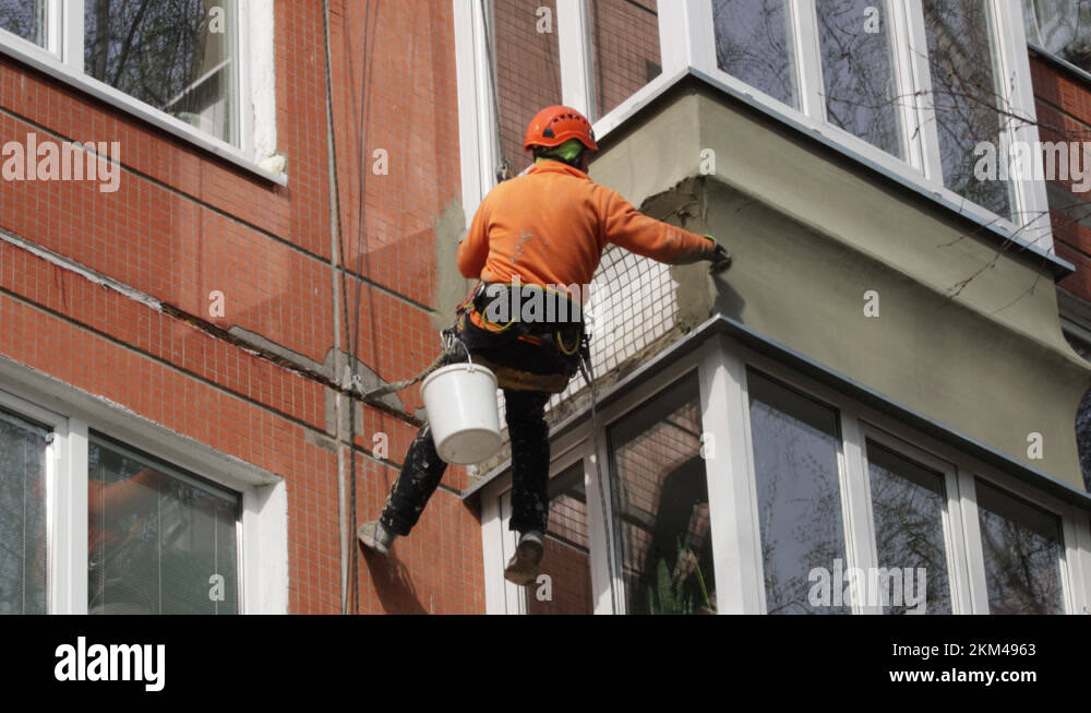 Maintenance worker hanging Stock Videos & Footage - HD and 4K Video ...