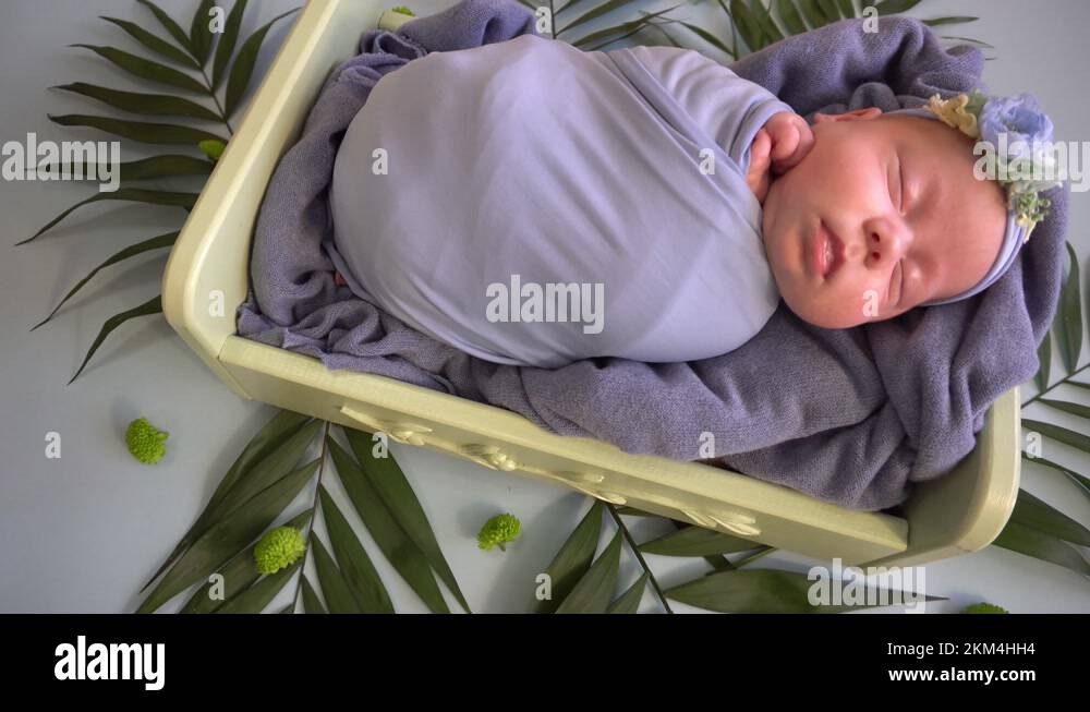 4K Adorable newborn baby girl sleeping in tiny bad Stock Video Footage ...