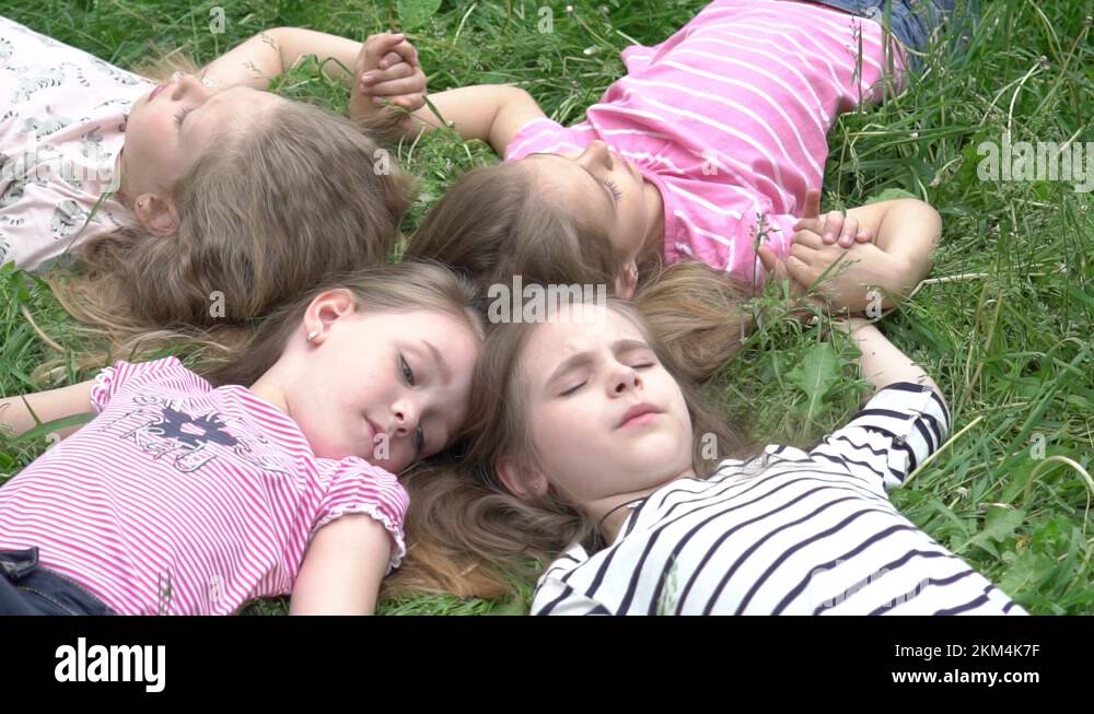 Happy children lying on grass Stock Videos & Footage - HD and 4K Video ...