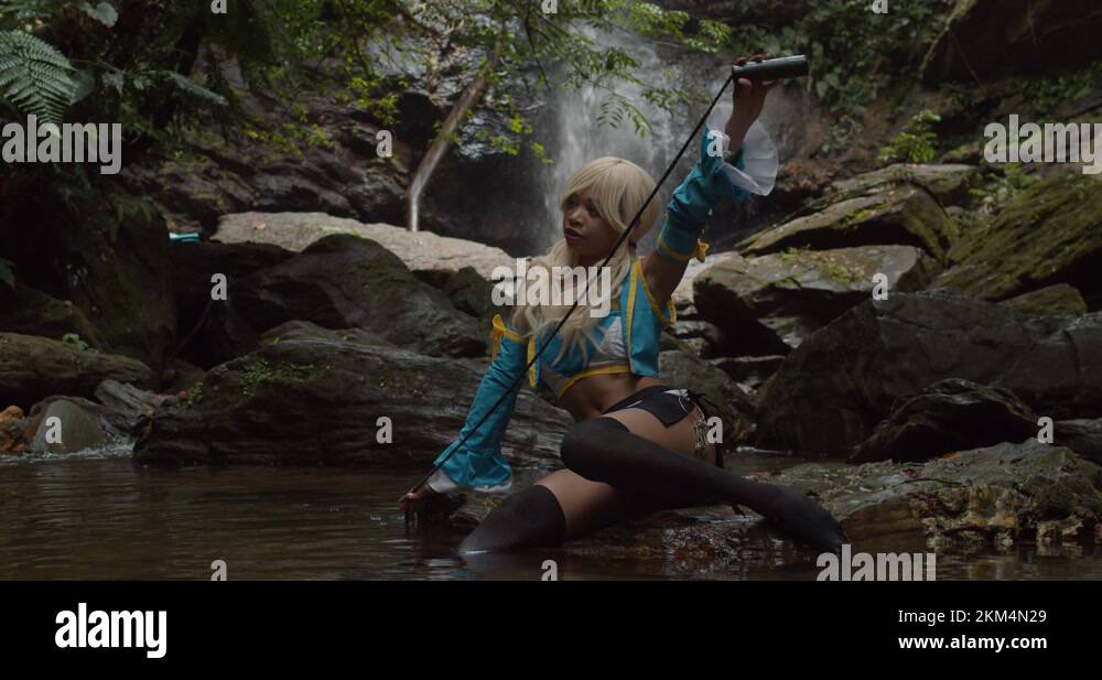 Lucy Heartfilia Cosplayer Holds Her Rope In Position As She Sits At The 4800
