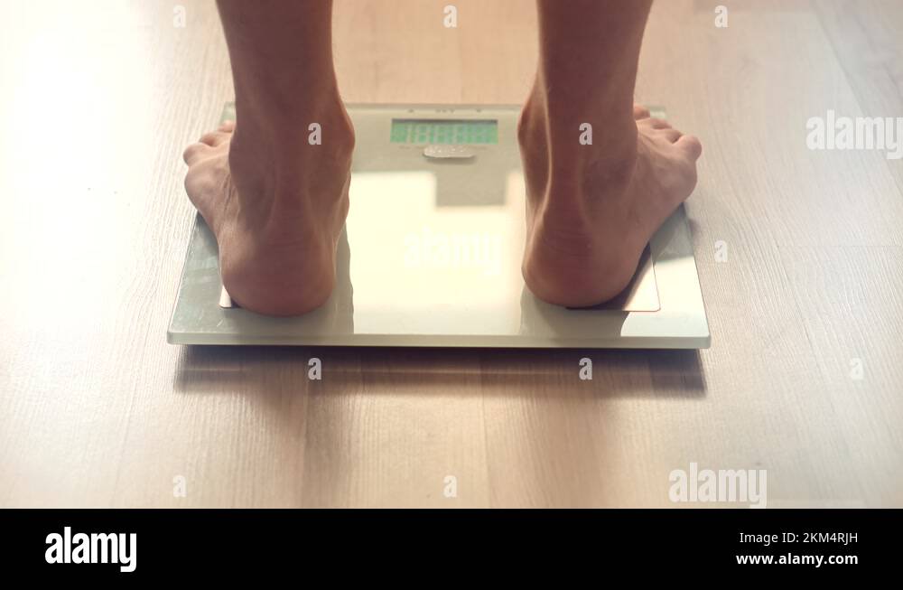 Man standing on bathroom scales Stock Videos & Footage - HD and 4K ...