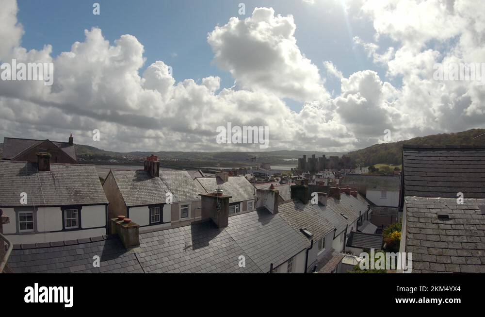 POV Conwy sunny houses rooftops inside medieval castle Welsh old town ...